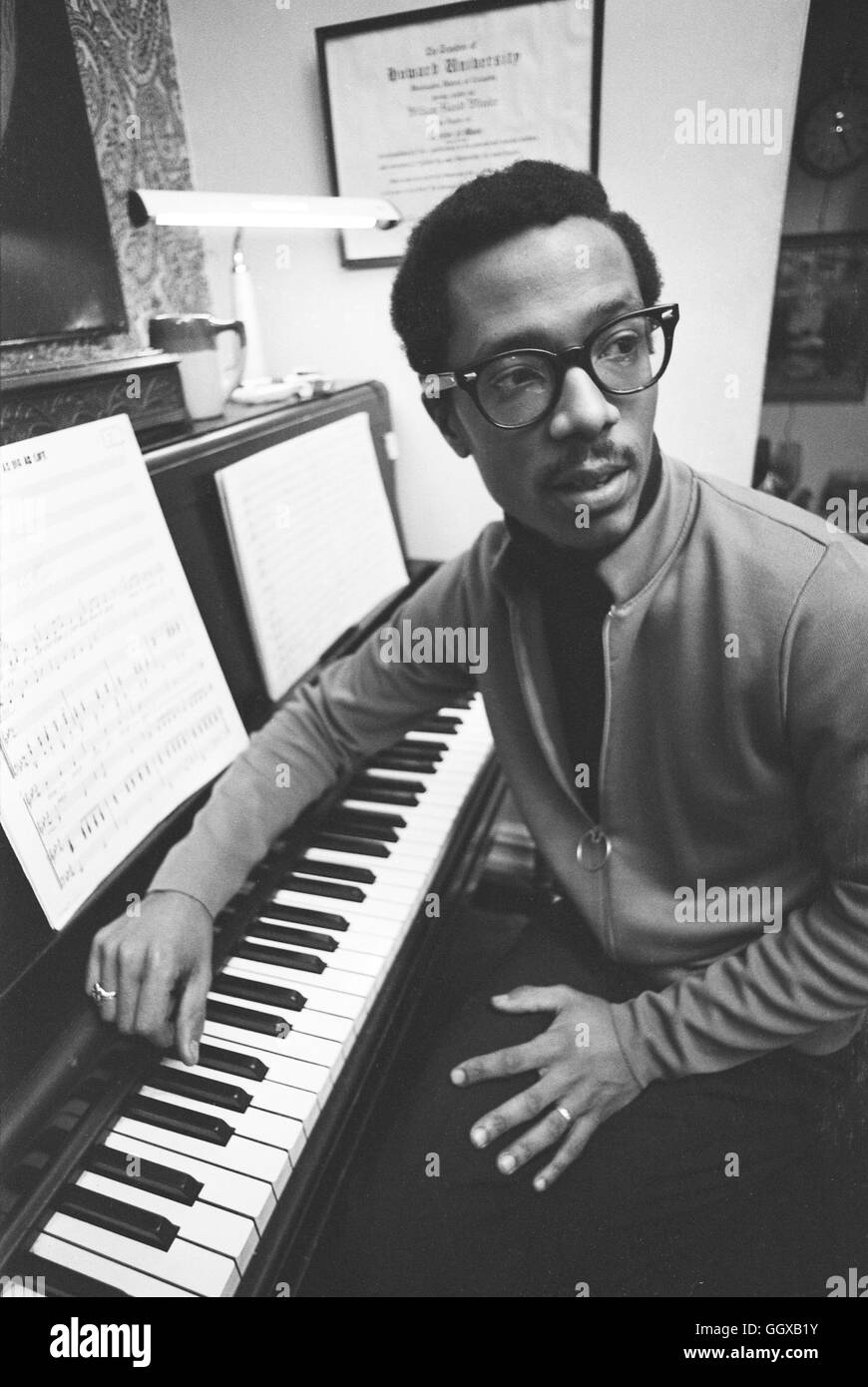 Harold Wheeler, composer and conductor, photographed by a piano in 1969 ...
