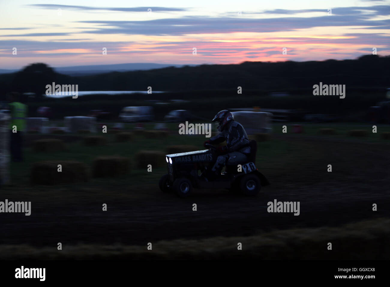 Teams compete in the BLMRA 12 Hour Lawn Mower Race near Five Oaks, west ...