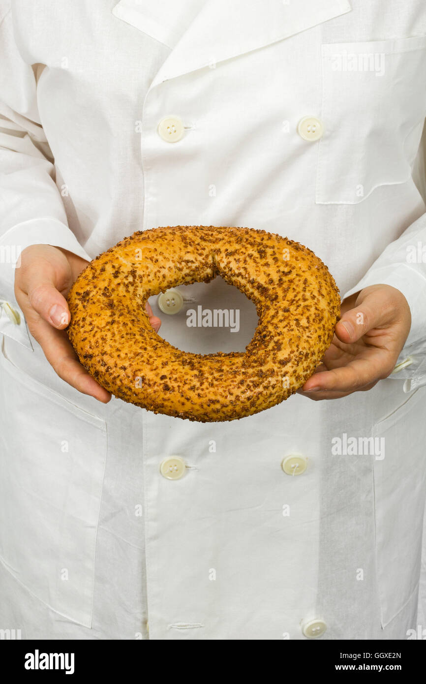 Fresh bakery in the hands of baker Stock Photo - Alamy