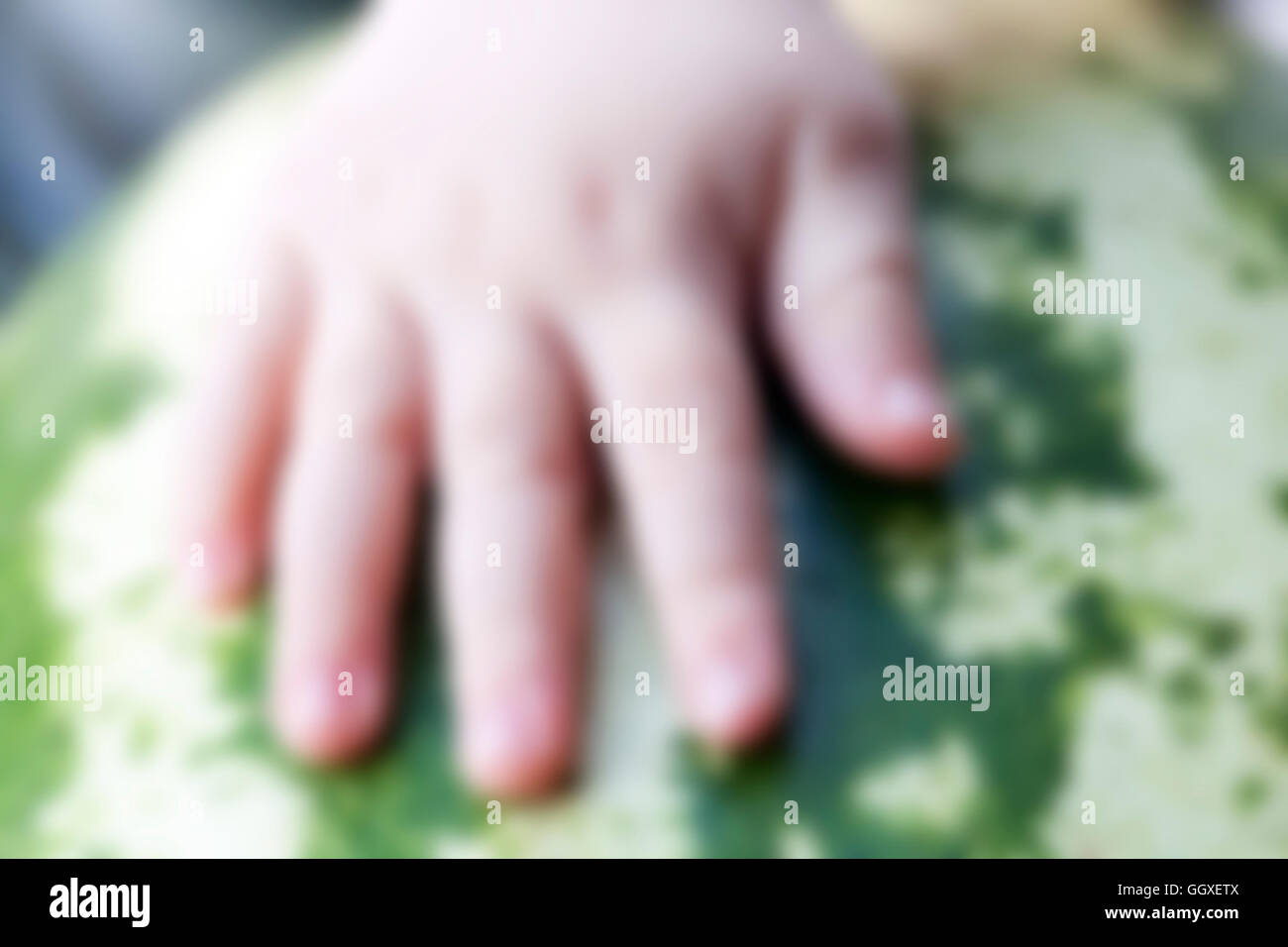 hand on watermelon Stock Photo - Alamy