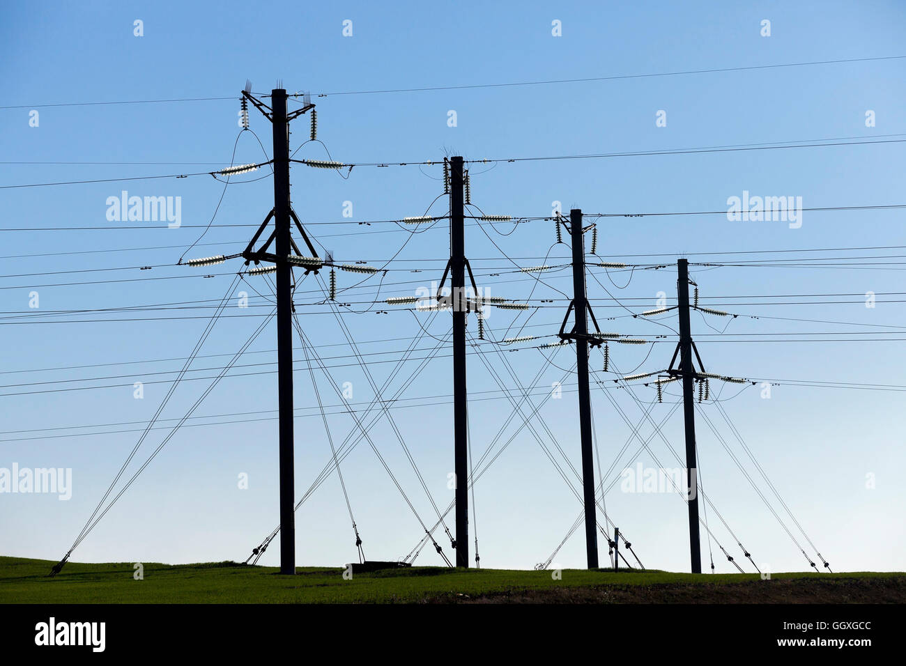 High-voltage power poles Stock Photo - Alamy