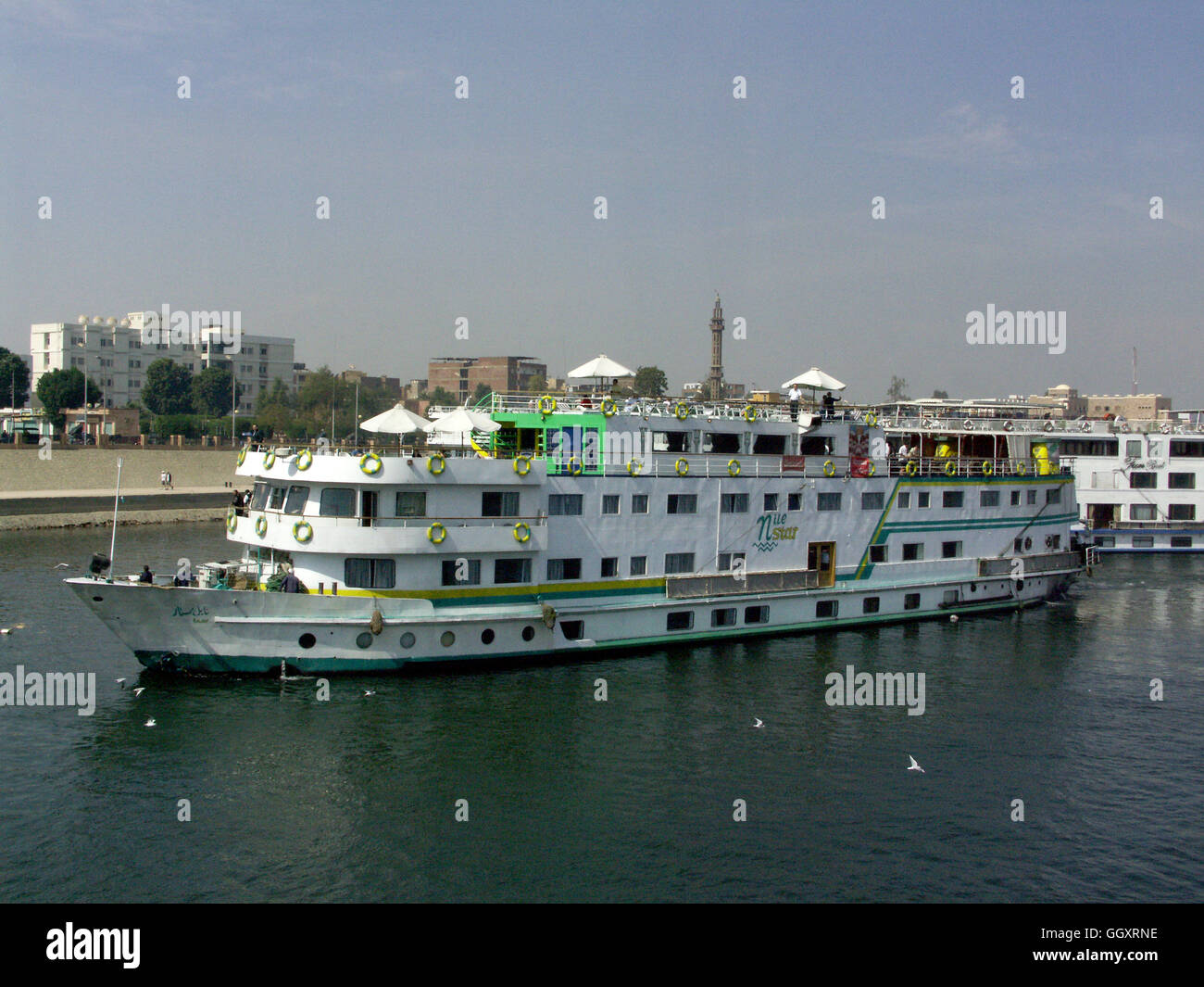 Cruise ship on the Nile River, leaving the port of Edfu for Aswan – Egypt Stock Photo - Alamy