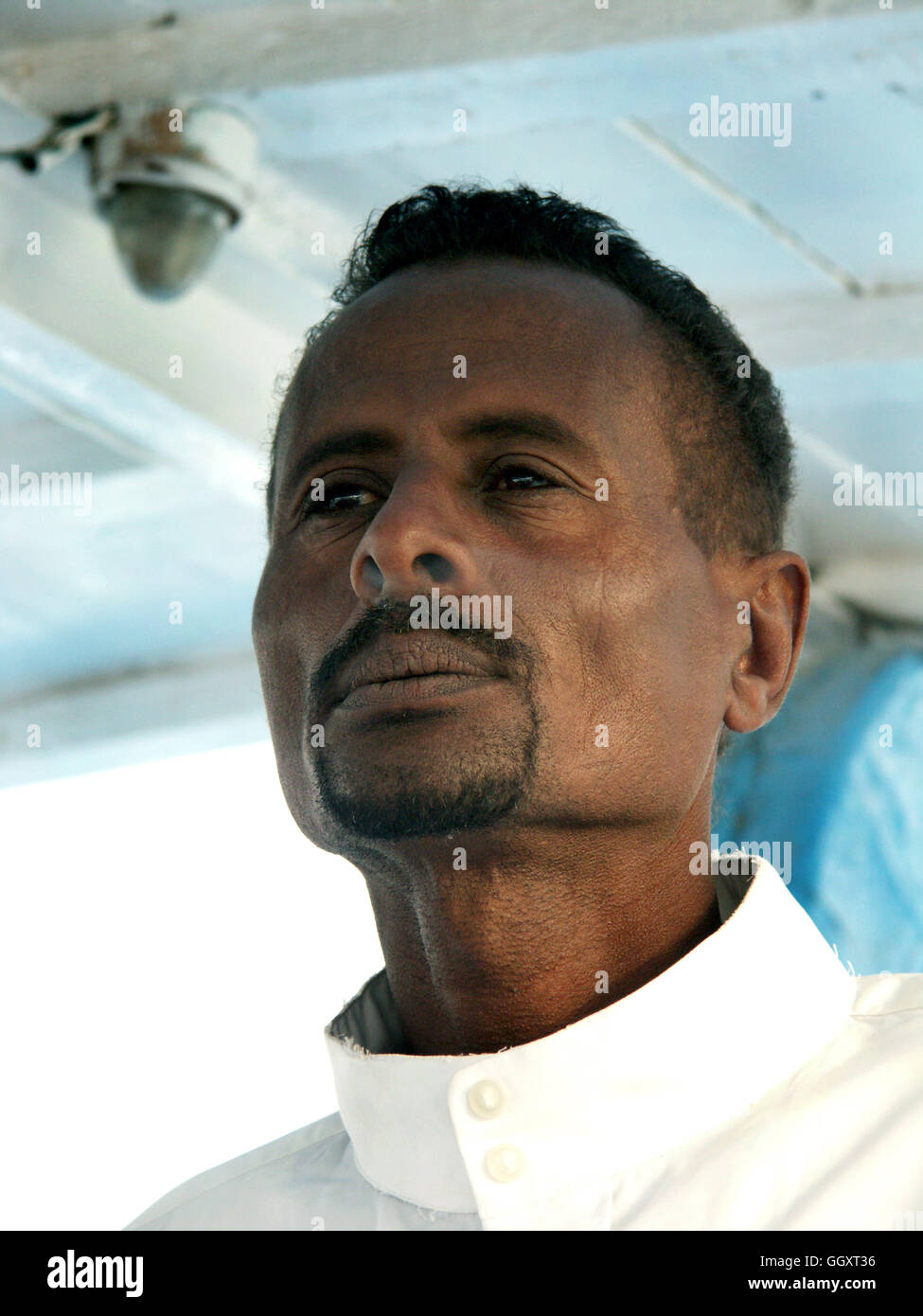 A Nubian boat captain on the Nile River at Aswan, en route to the ...