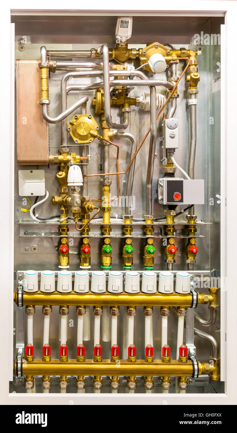 Heating floor system collector Stock Photo - Alamy