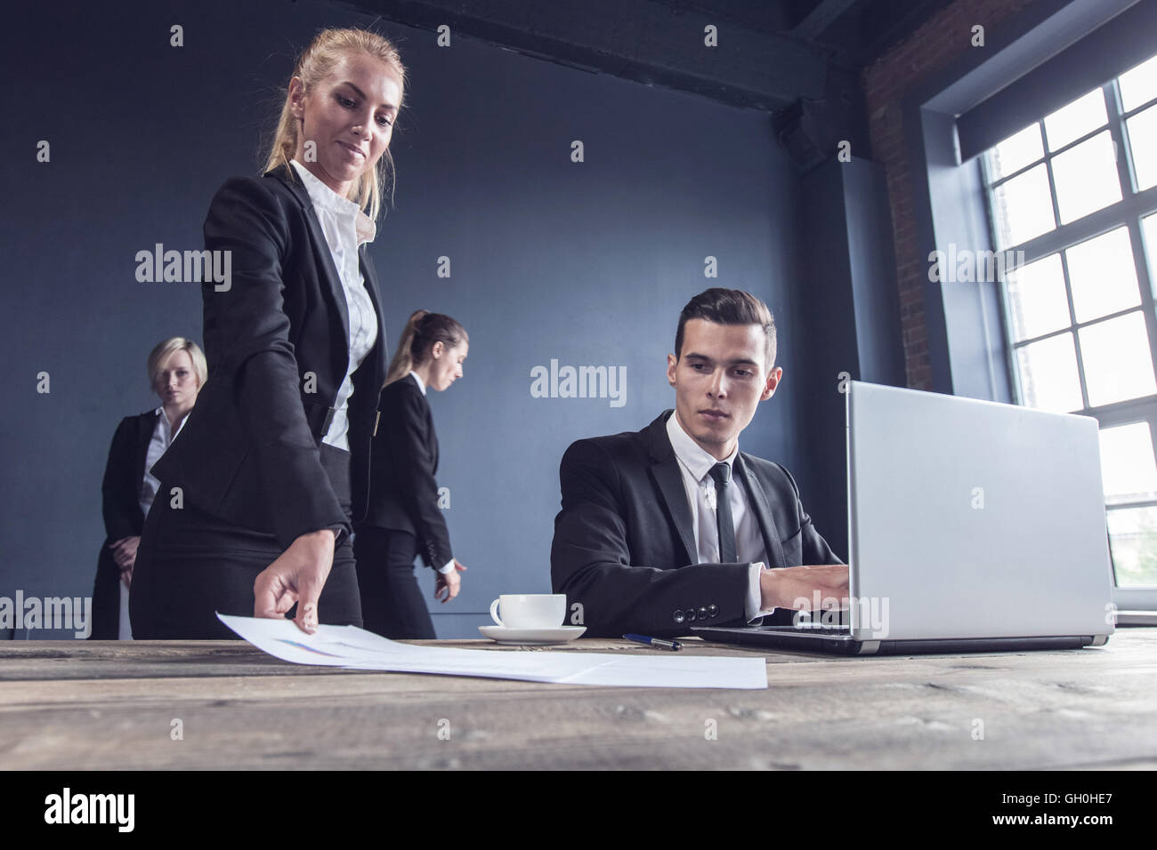 Business man getting extra work hi-res stock photography and images - Alamy