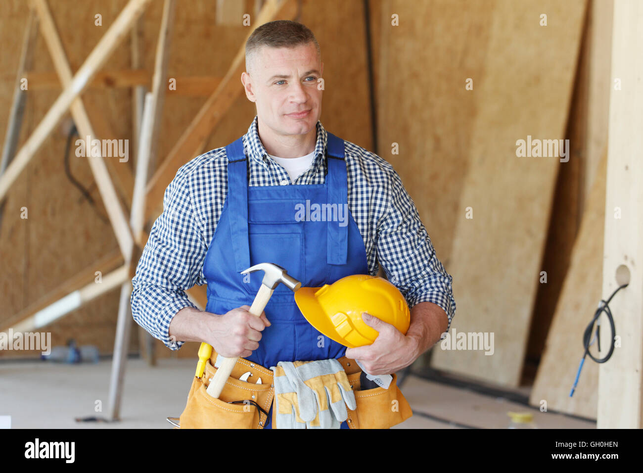 Handyman construction worker in helmet hi-res stock photography and ...