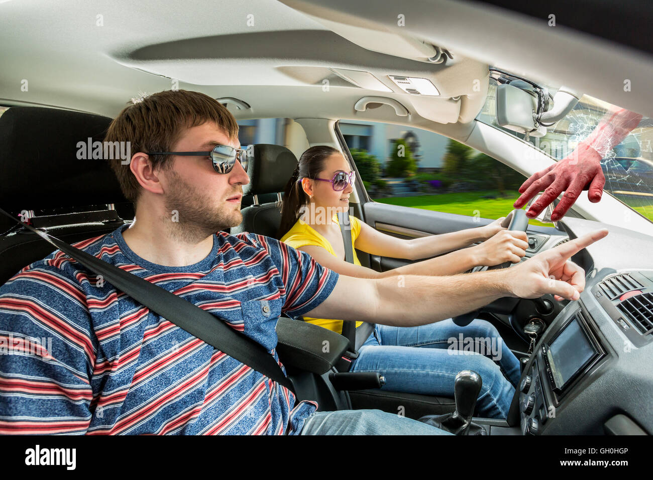 Couple driving the car Stock Photo - Alamy