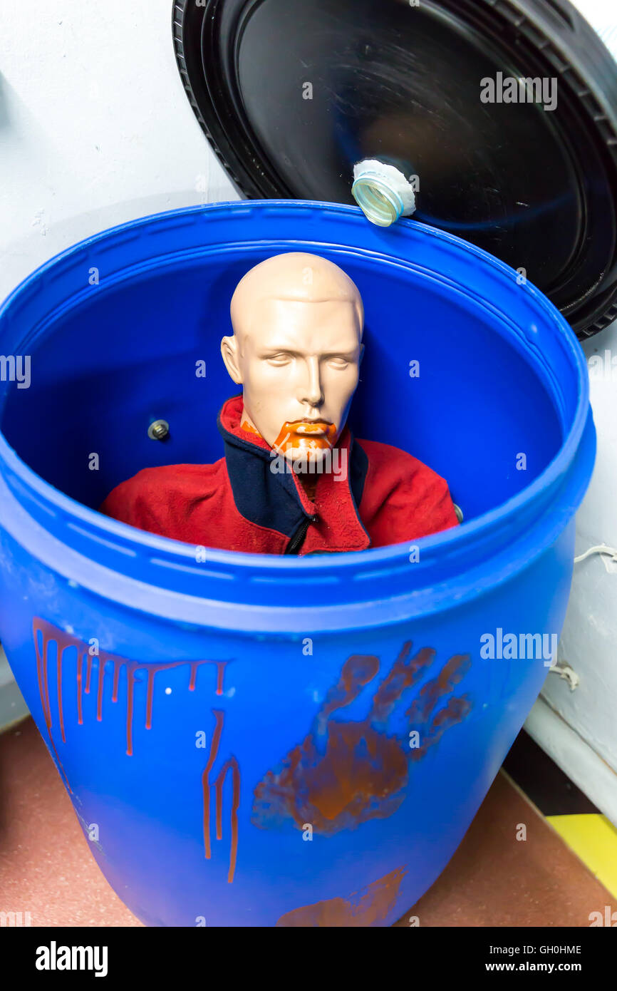 Plastic man in the bin Stock Photo - Alamy