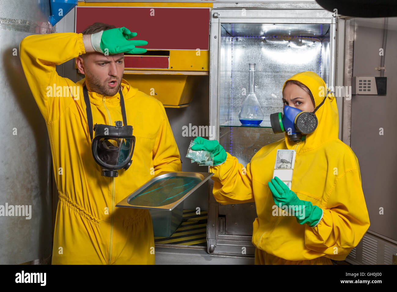 Man and woman cooking meth Stock Photo - Alamy