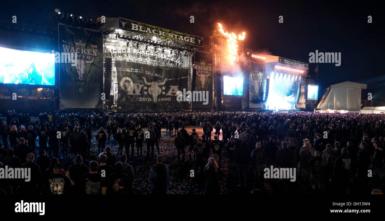Wacken, Germany. 06th Aug, 2016. Metal fans on the grounds of the ...