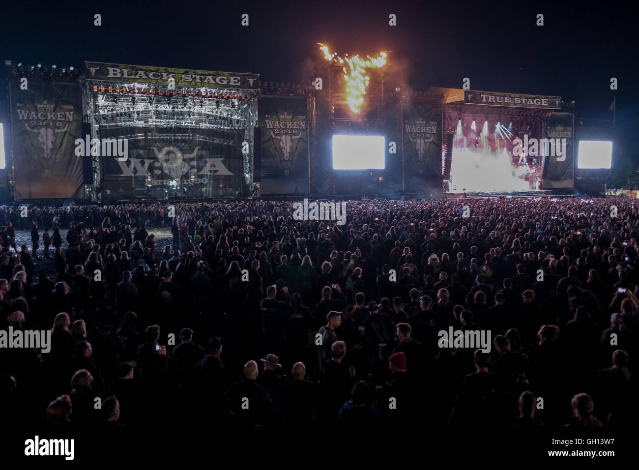 Wacken, Germany. 06th Aug, 2016. Metal fans on the grounds of the ...