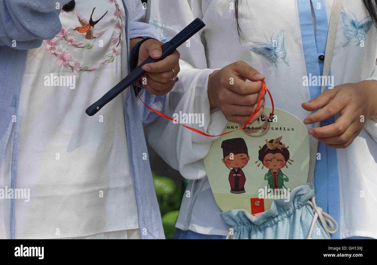Beijing, China. 7th Aug, 2016. People in Han-style costumes or Hanfu ...