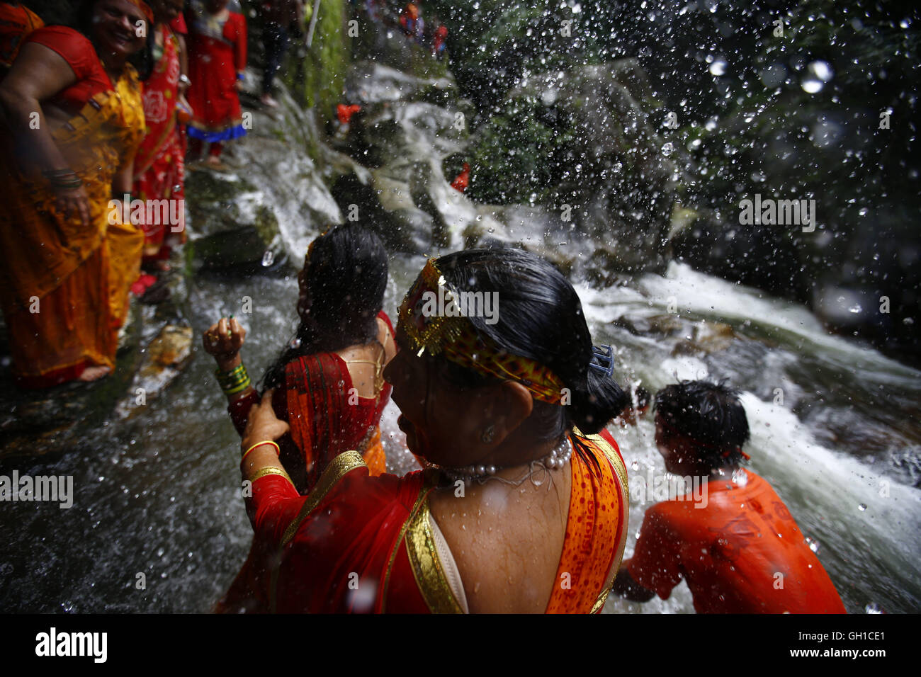 Kathmandu, Nepal. 8th Aug, 2016. Hindu worshippers or pilgrims also ...