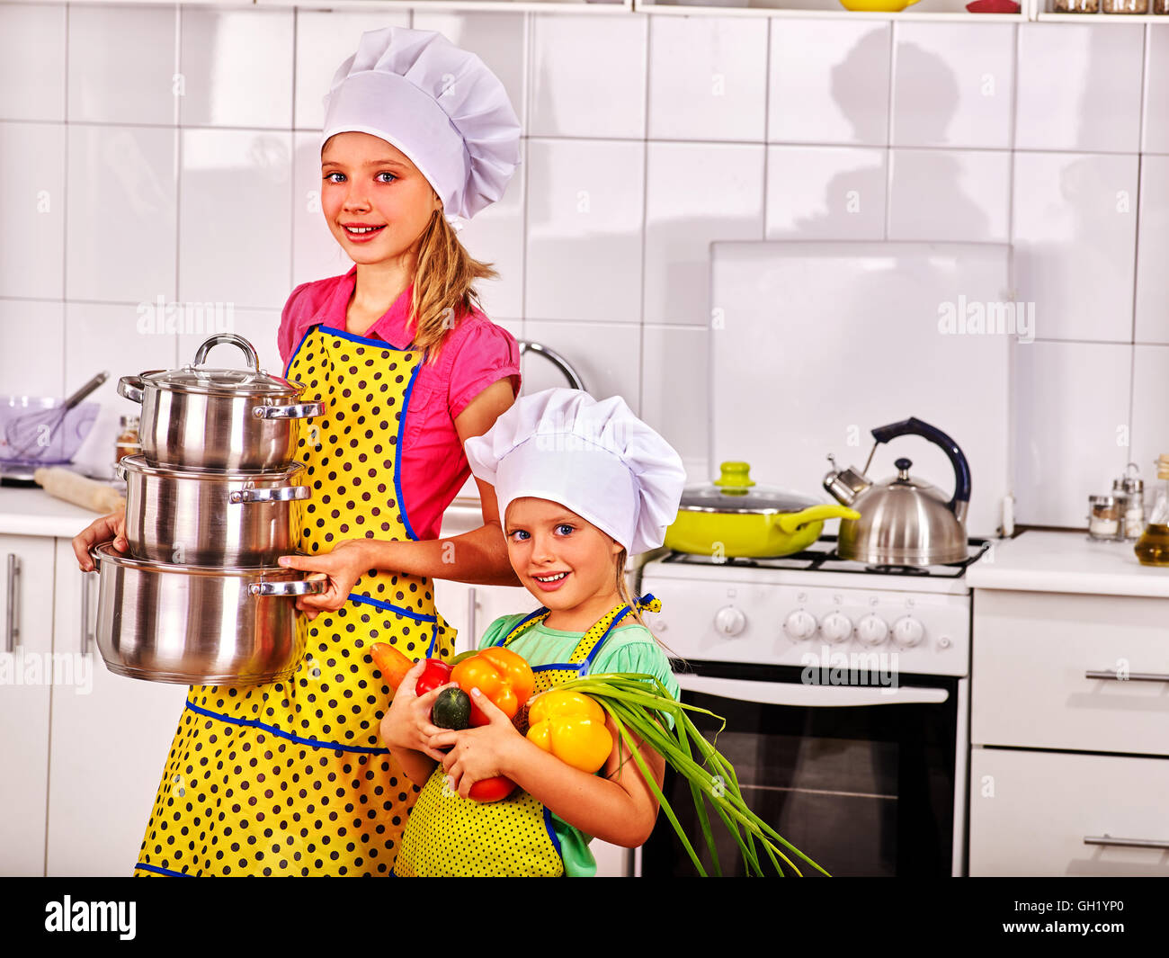 Children cooking at kitchen Stock Photo - Alamy