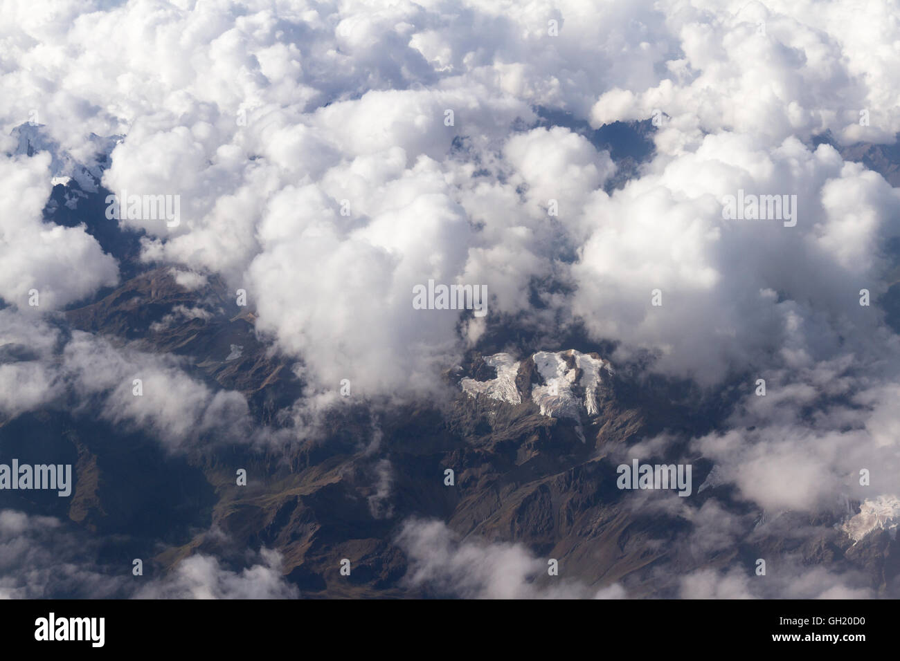 Peru - May 11 : Aerial view of the snow caped mountains of Peru from an ...