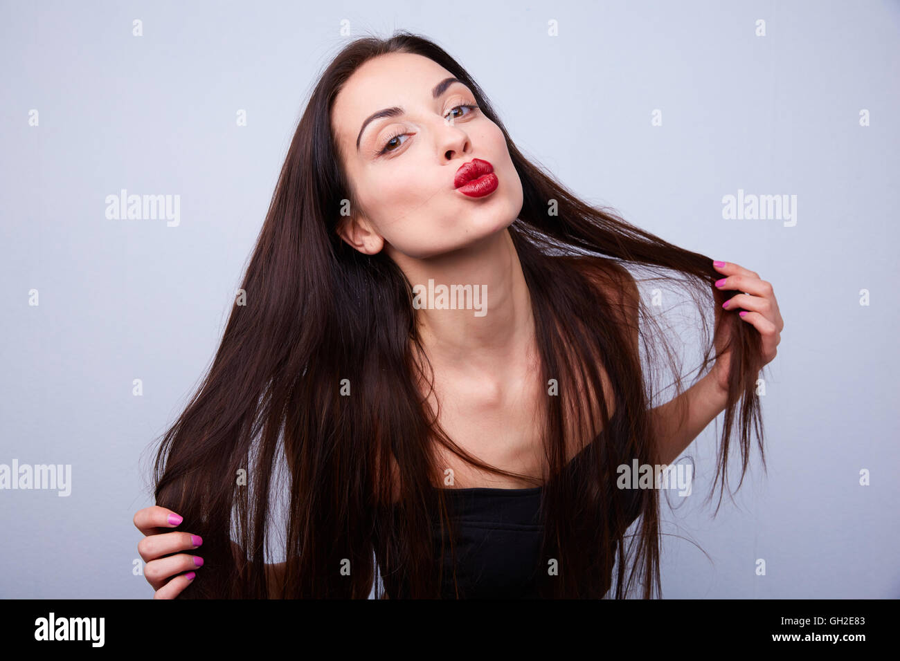 beautiful girl sends an air kiss Stock Photo - Alamy