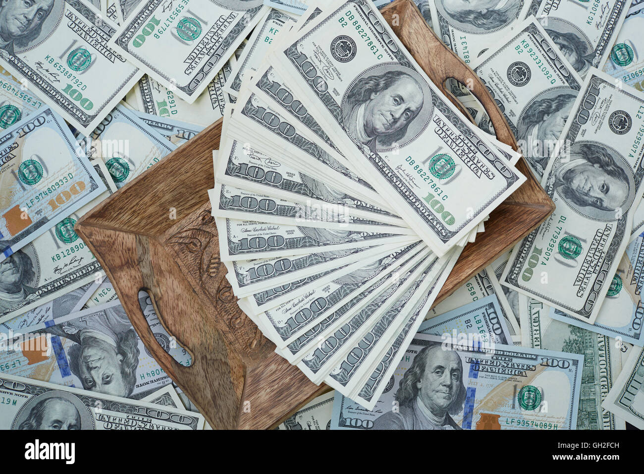 Money on a tray Stock Photo - Alamy