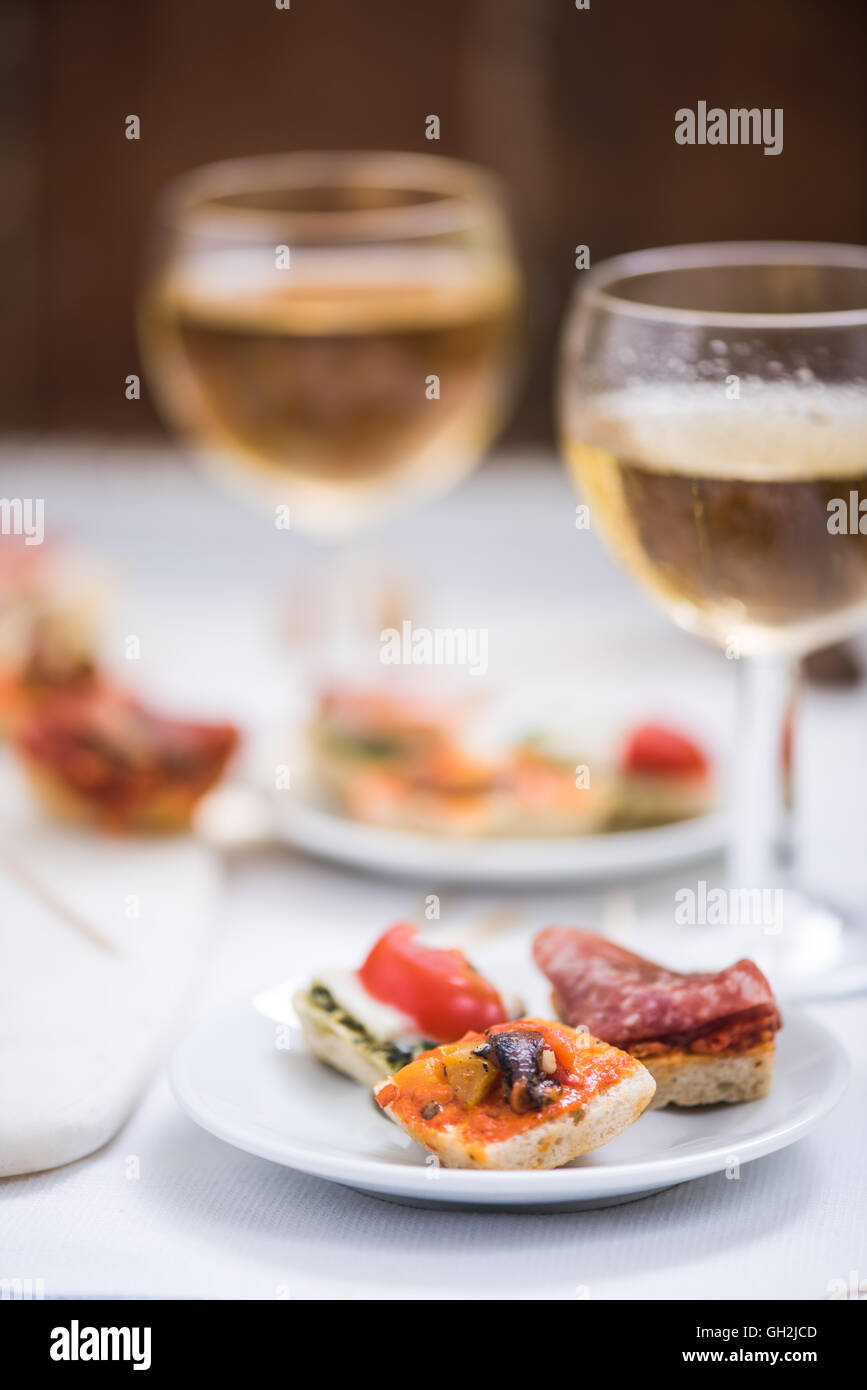 spanish or italian snack antipasti and wine Stock Photo - Alamy