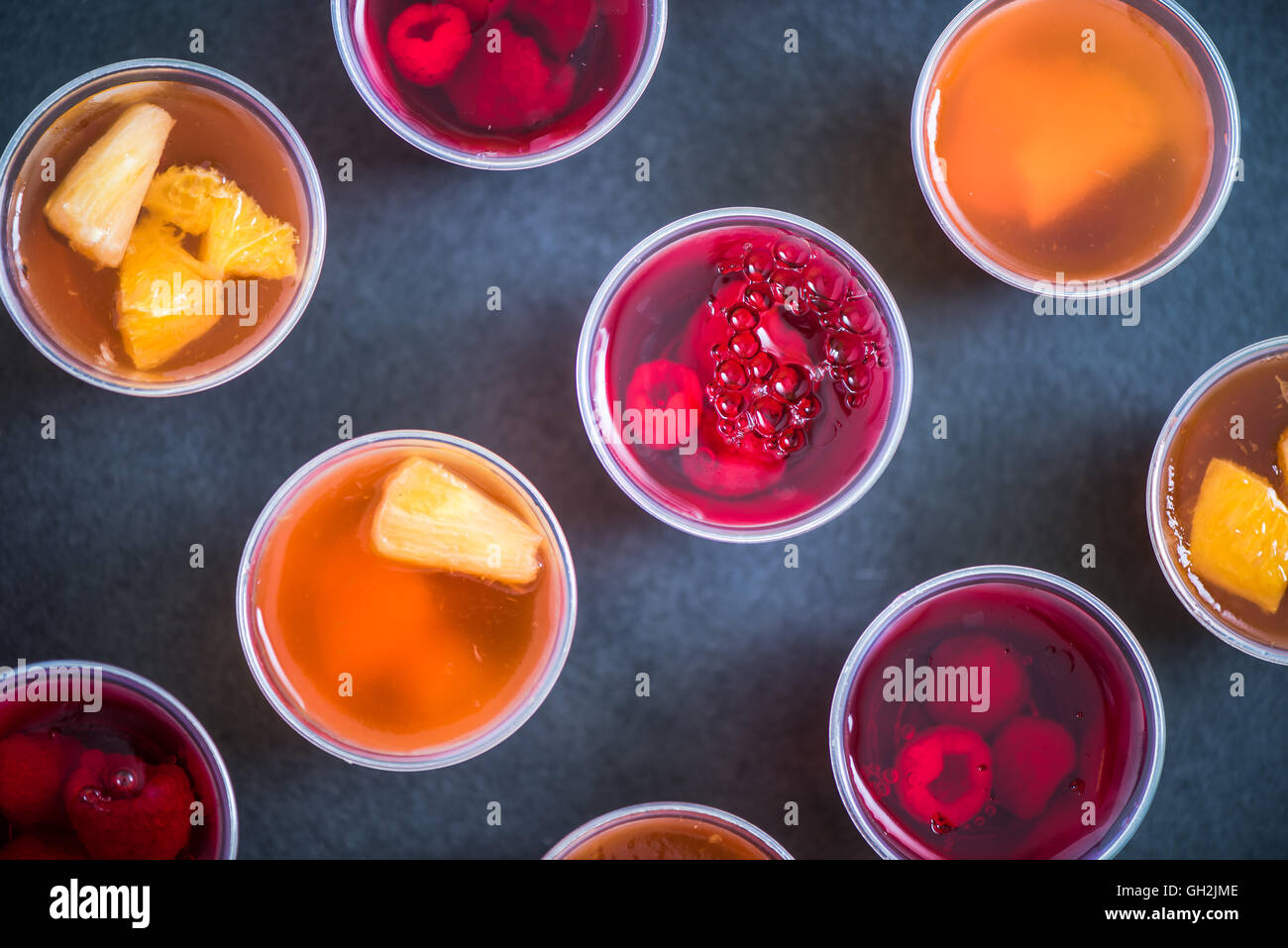 homemade fruit jelly in plastic cups, overhead view Stock Photo - Alamy
