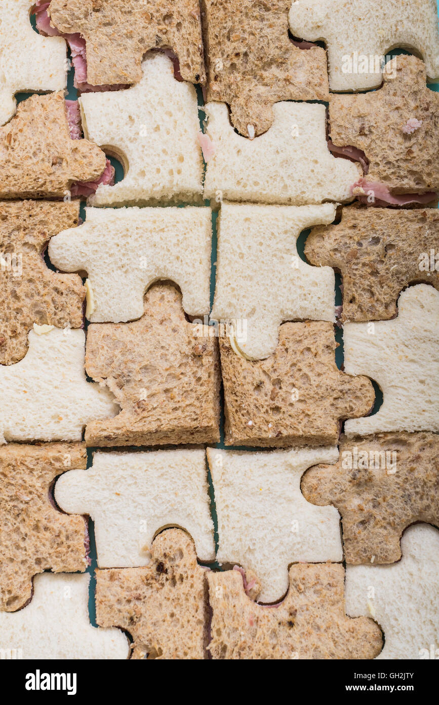 jigsaw puzzle made from bread, kid party food Stock Photo - Alamy