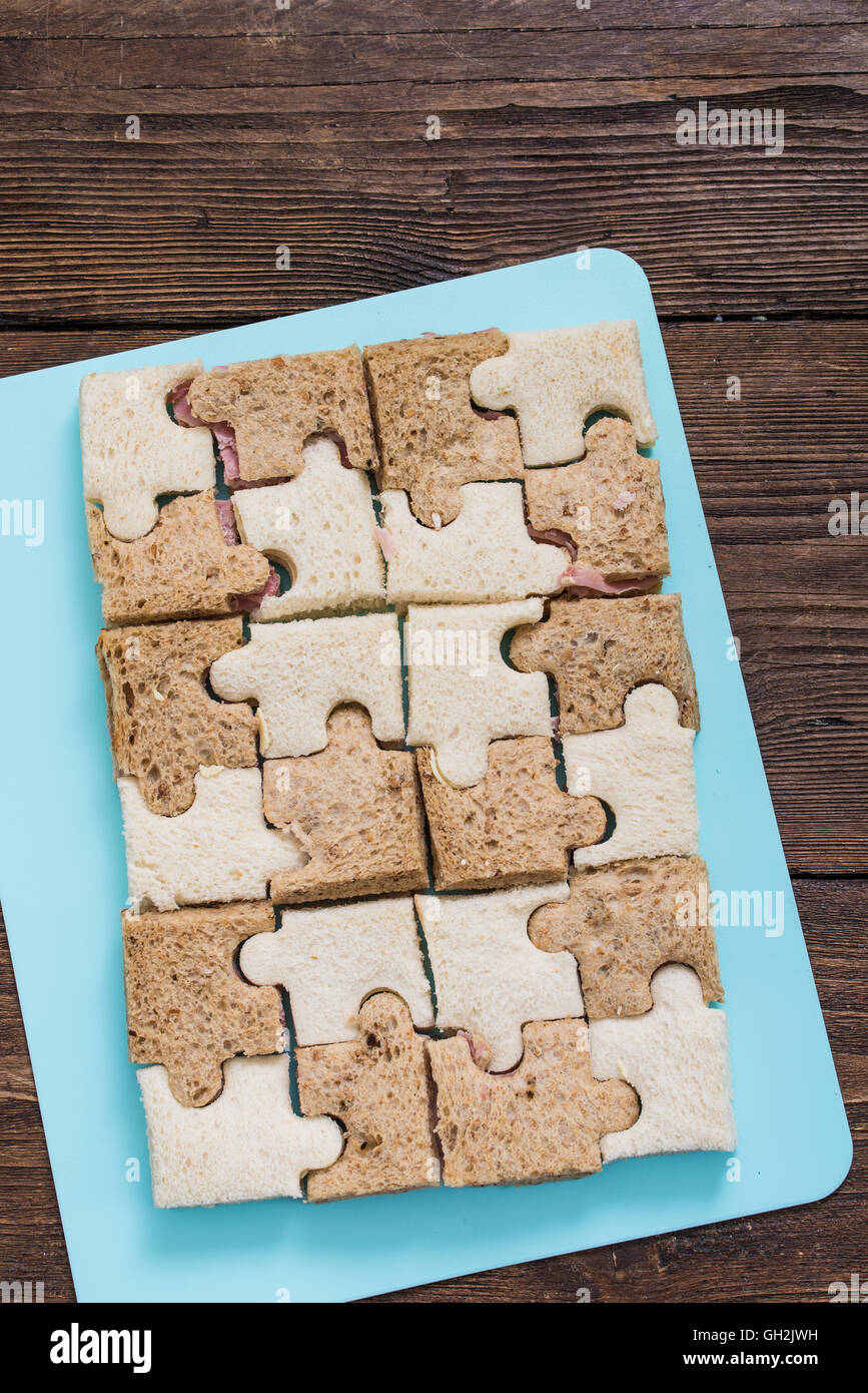 jigsaw puzzle made from bread, kid party food Stock Photo - Alamy