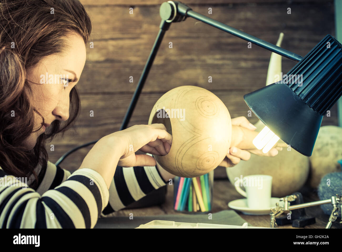 young woman making decorative items in workshop Stock Photo - Alamy