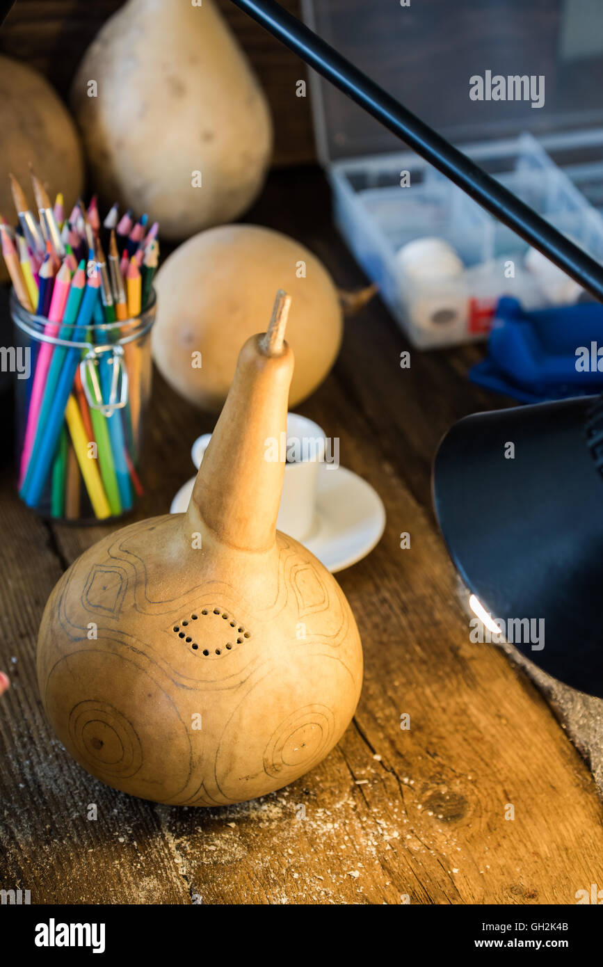 carving in calabash or gourd, creative artisan craft Stock Photo - Alamy
