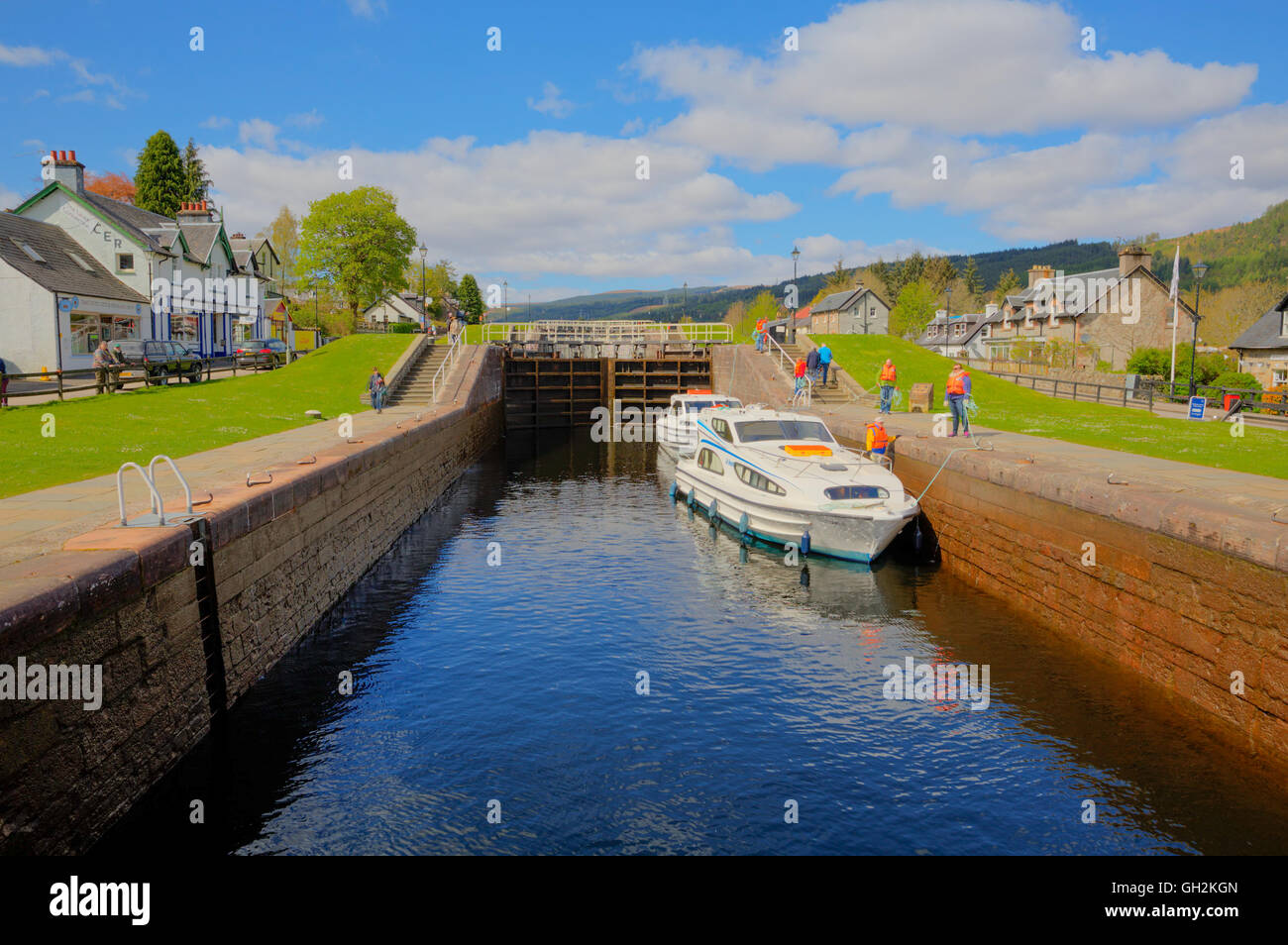 Boats moving through the lock gates on the Caledonian Canal Fort ...