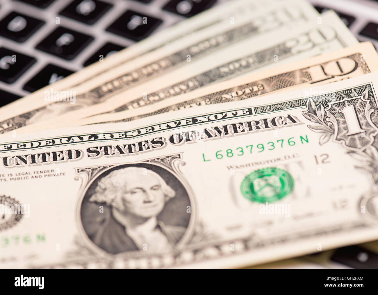 Money and electronic devices Stock Photo - Alamy