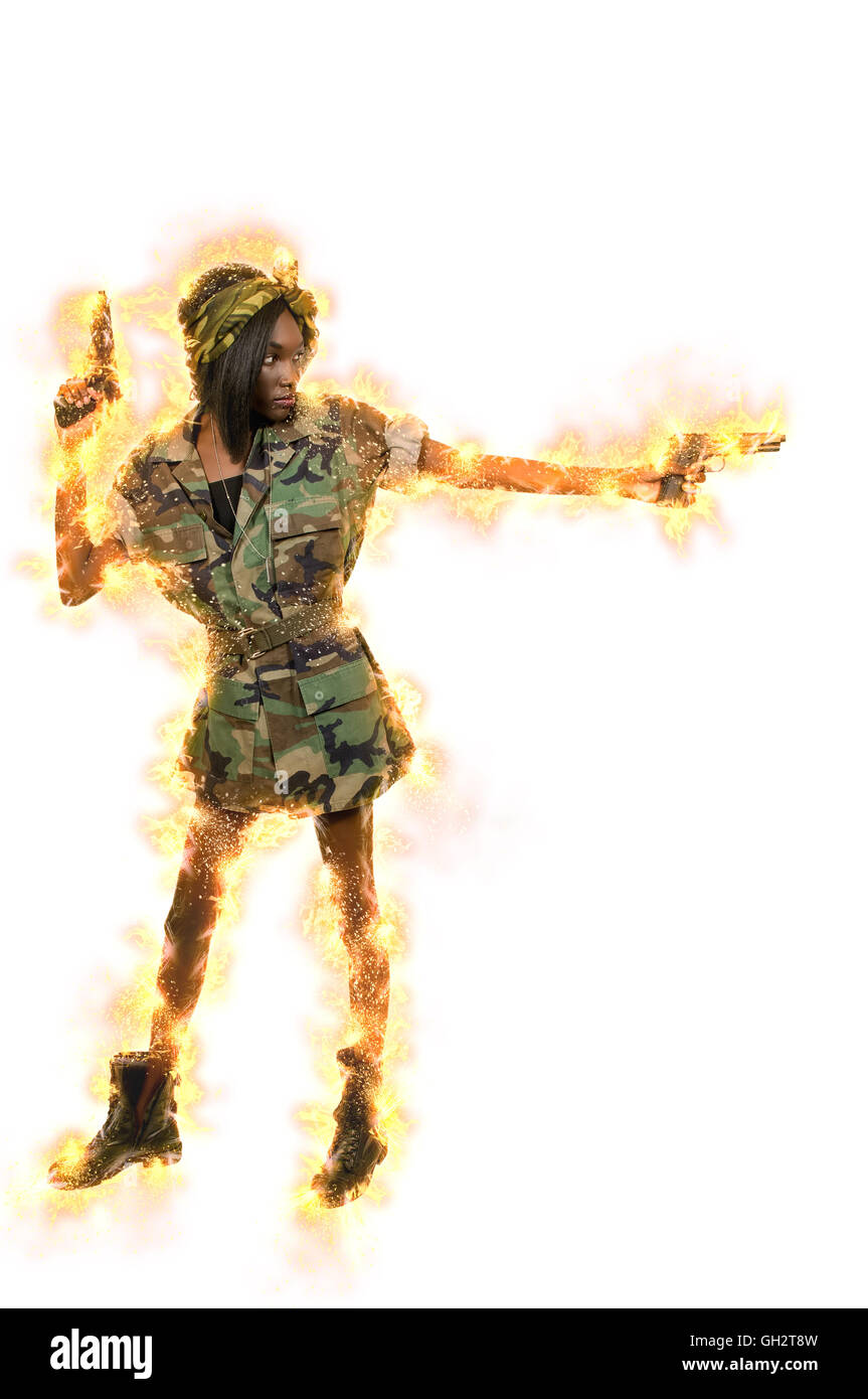 Gun toting beautiful young woman soldier with pistols Stock Photo - Alamy