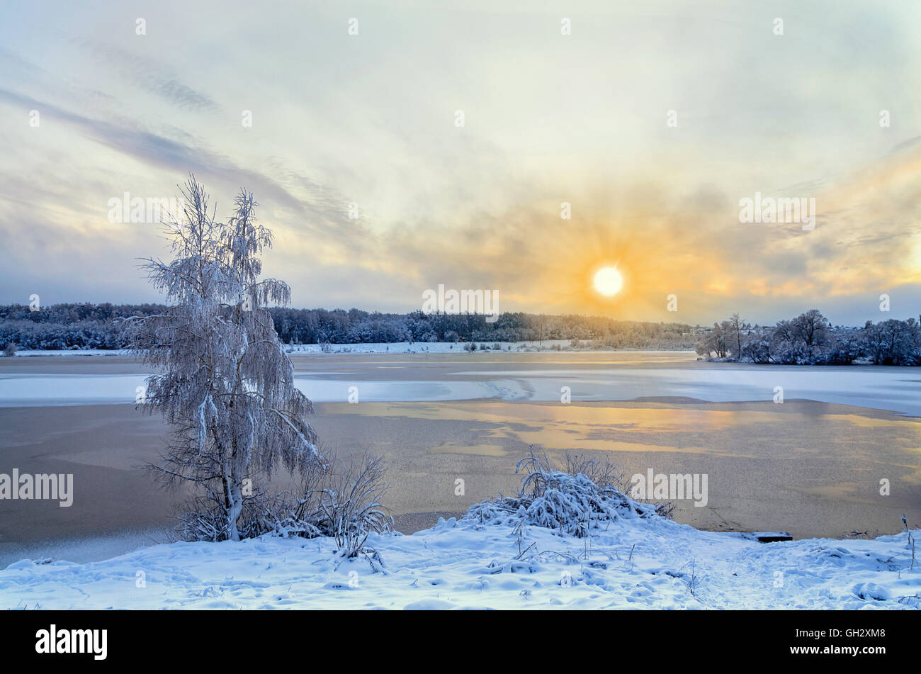 Winter evening landscape with a lake and trees in the frost Stock Photo ...