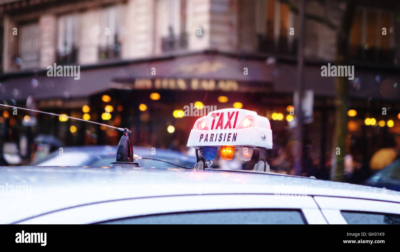 Taxi in Paris Stock Photo - Alamy