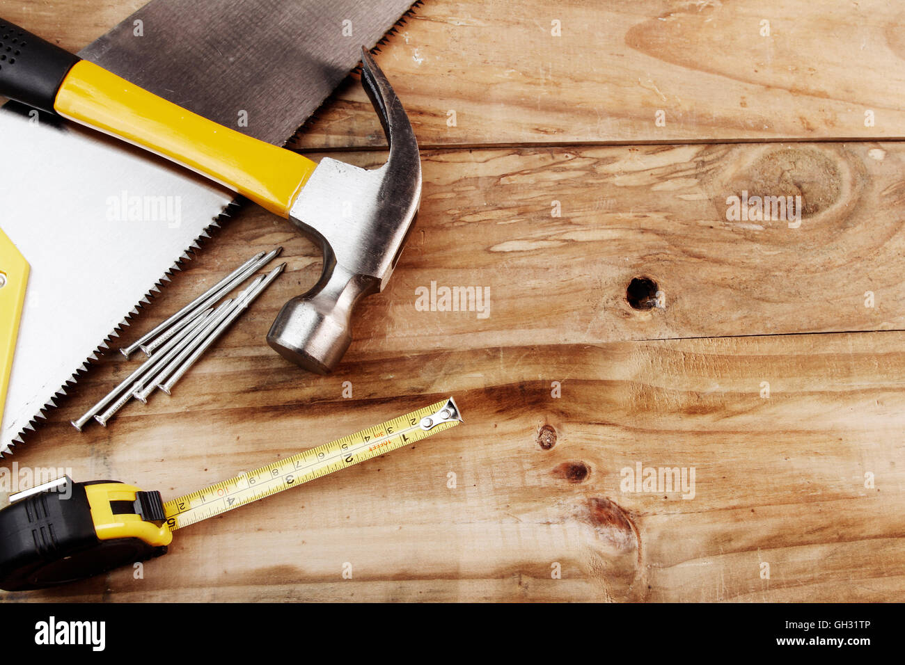Assortment of tools on wood Stock Photo - Alamy