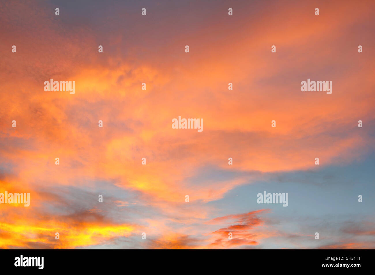 Sunlit clouds in summer sky Stock Photo - Alamy