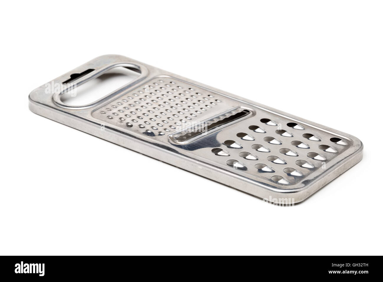 Metal kitchen food grater over white background Stock Photo - Alamy