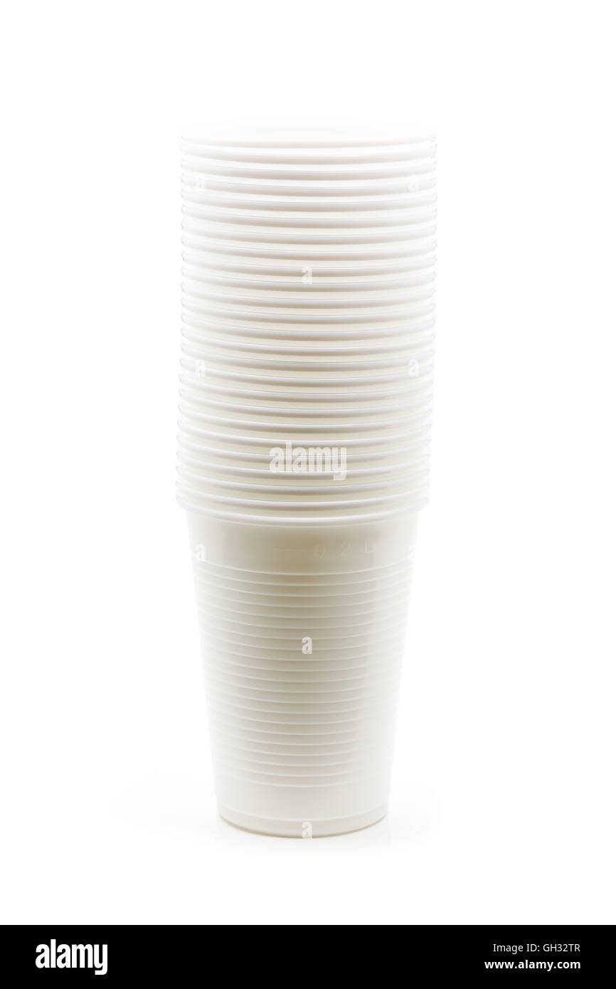 Stacked white plastic cups over white background Stock Photo - Alamy