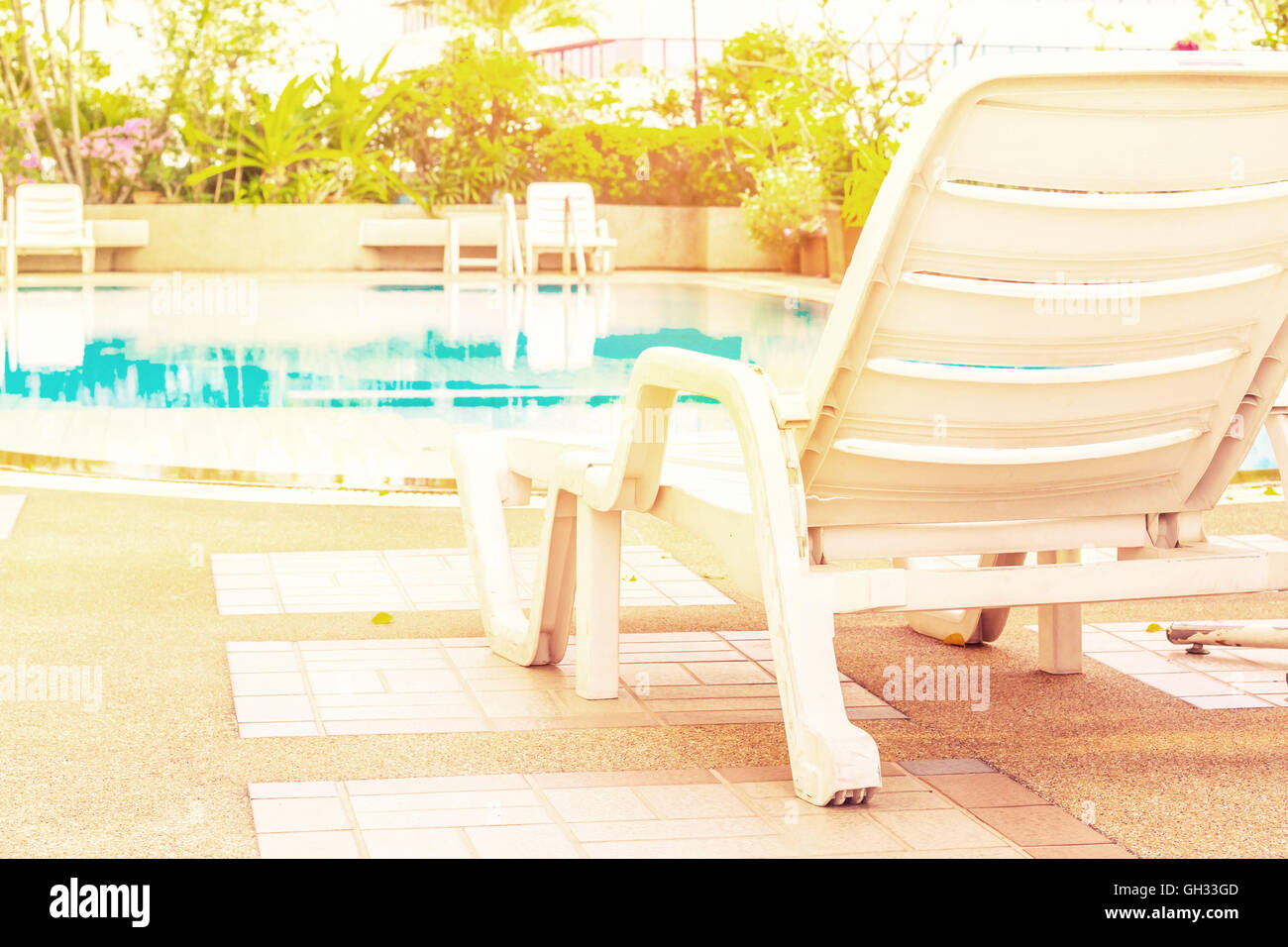 Chairs for lounging in the pool Stock Photo - Alamy
