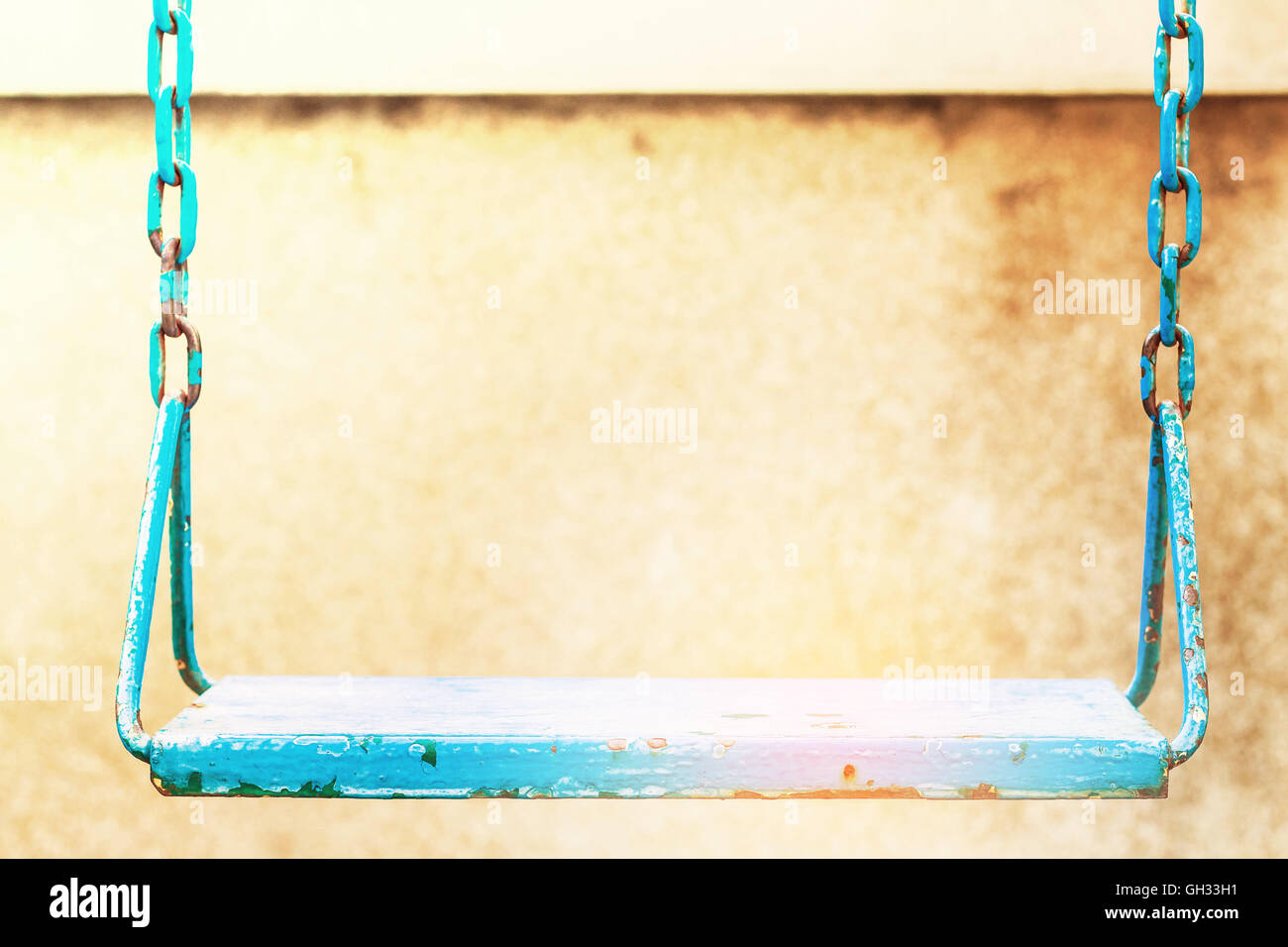 blue swings in a playground Stock Photo - Alamy