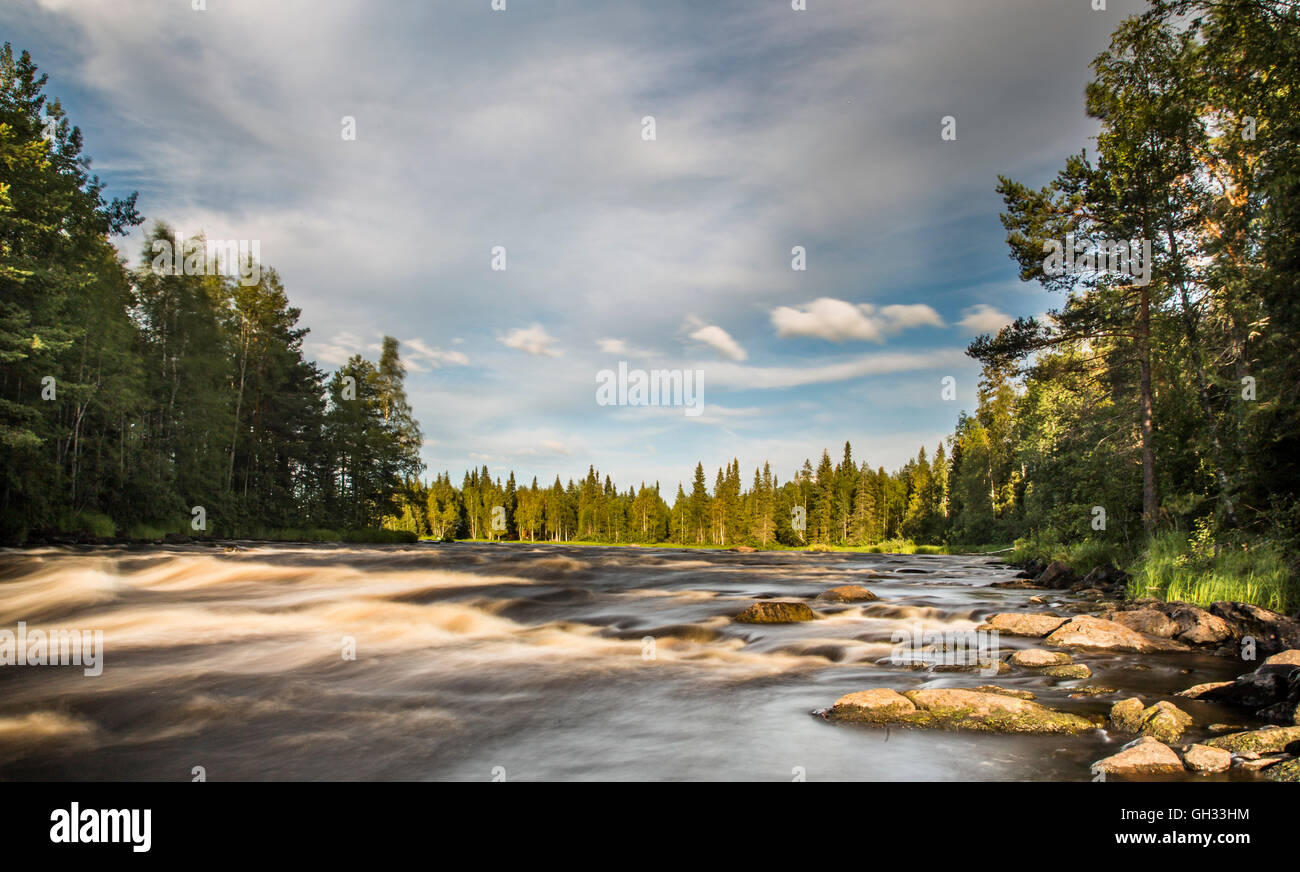 Fast moving river in Finish Lapland Stock Photo - Alamy