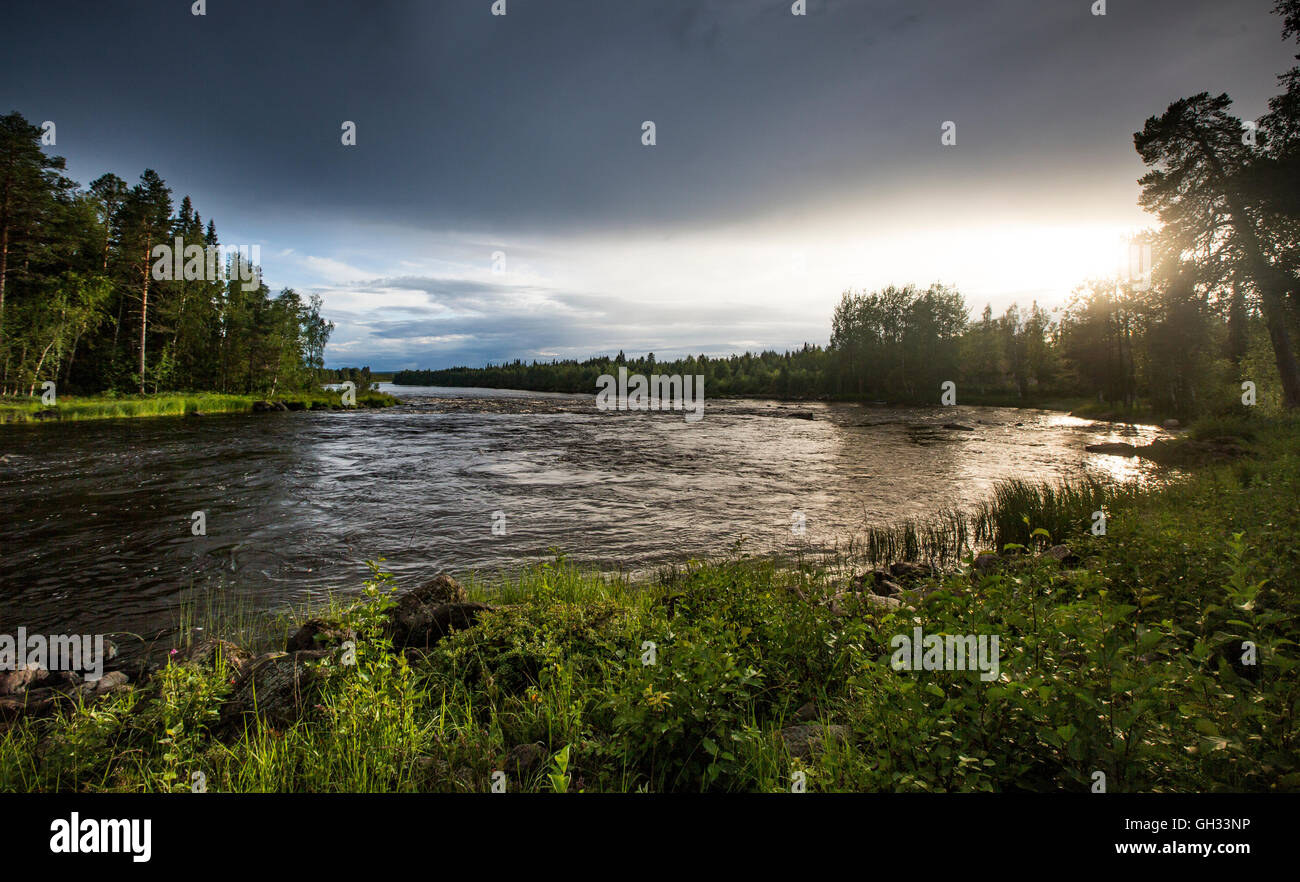 Fast moving river in Finish Lapland Stock Photo - Alamy