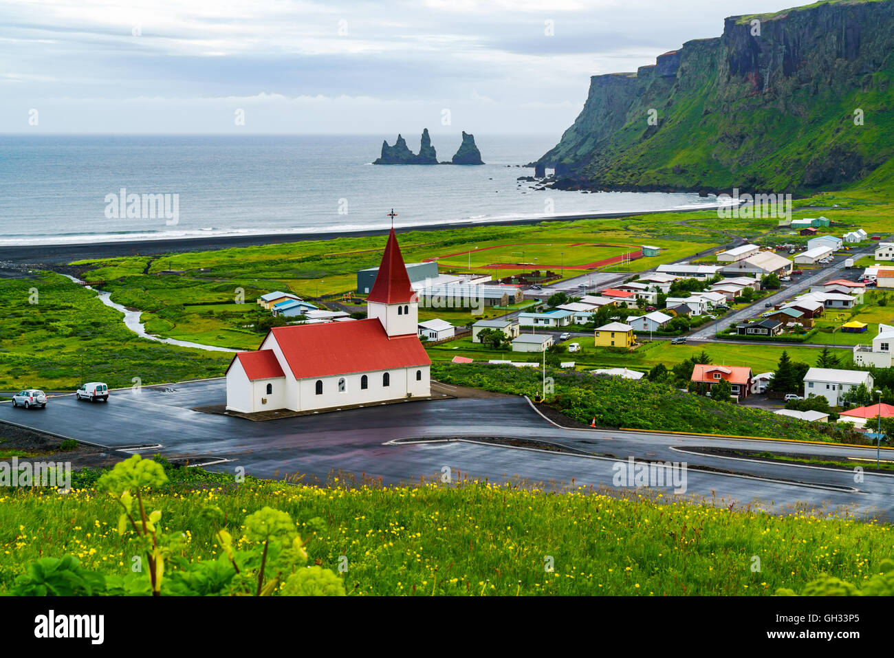 View of church at the village of Vik in southern Iceland Stock Photo ...