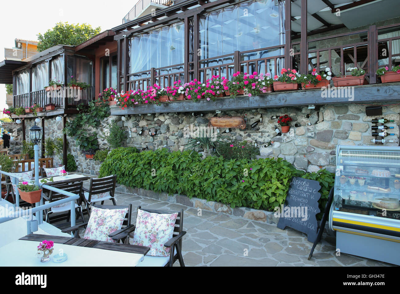 Cafe terrace on the beach hi-res stock photography and images - Alamy