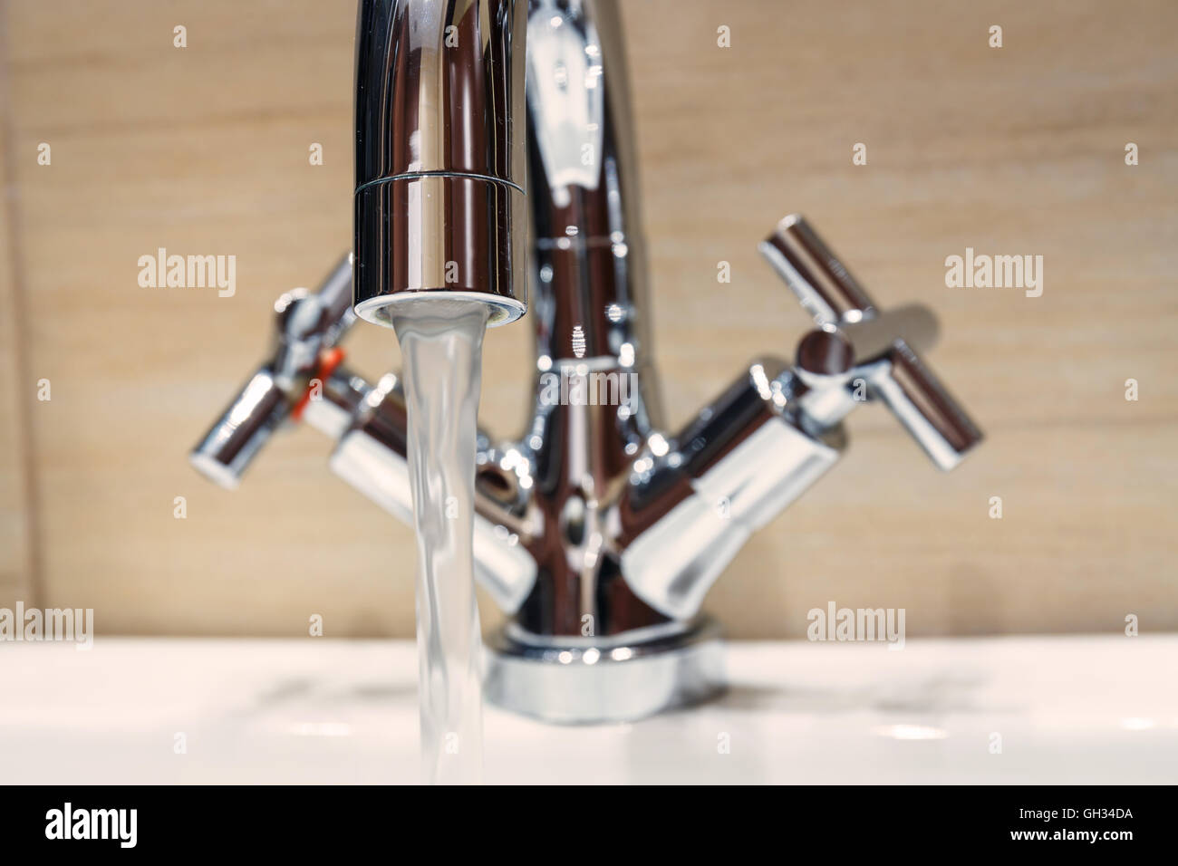 water tap with modern design in bathroom Stock Photo - Alamy