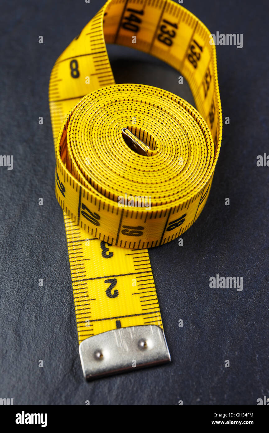 yellow measuring tape Stock Photo - Alamy