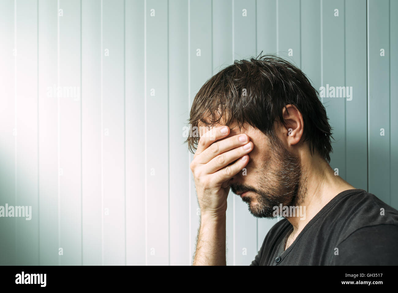 Troubled expression hi-res stock photography and images - Alamy