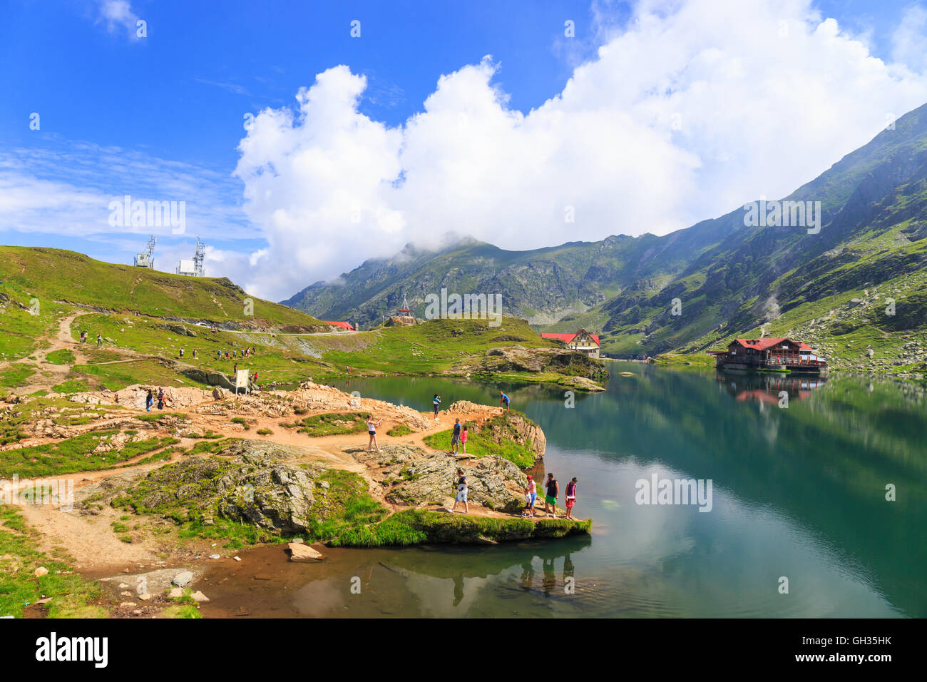 BALEA LAKE, ROMANIA - JULY 21: Unidentified tourists enjoy the sights ...