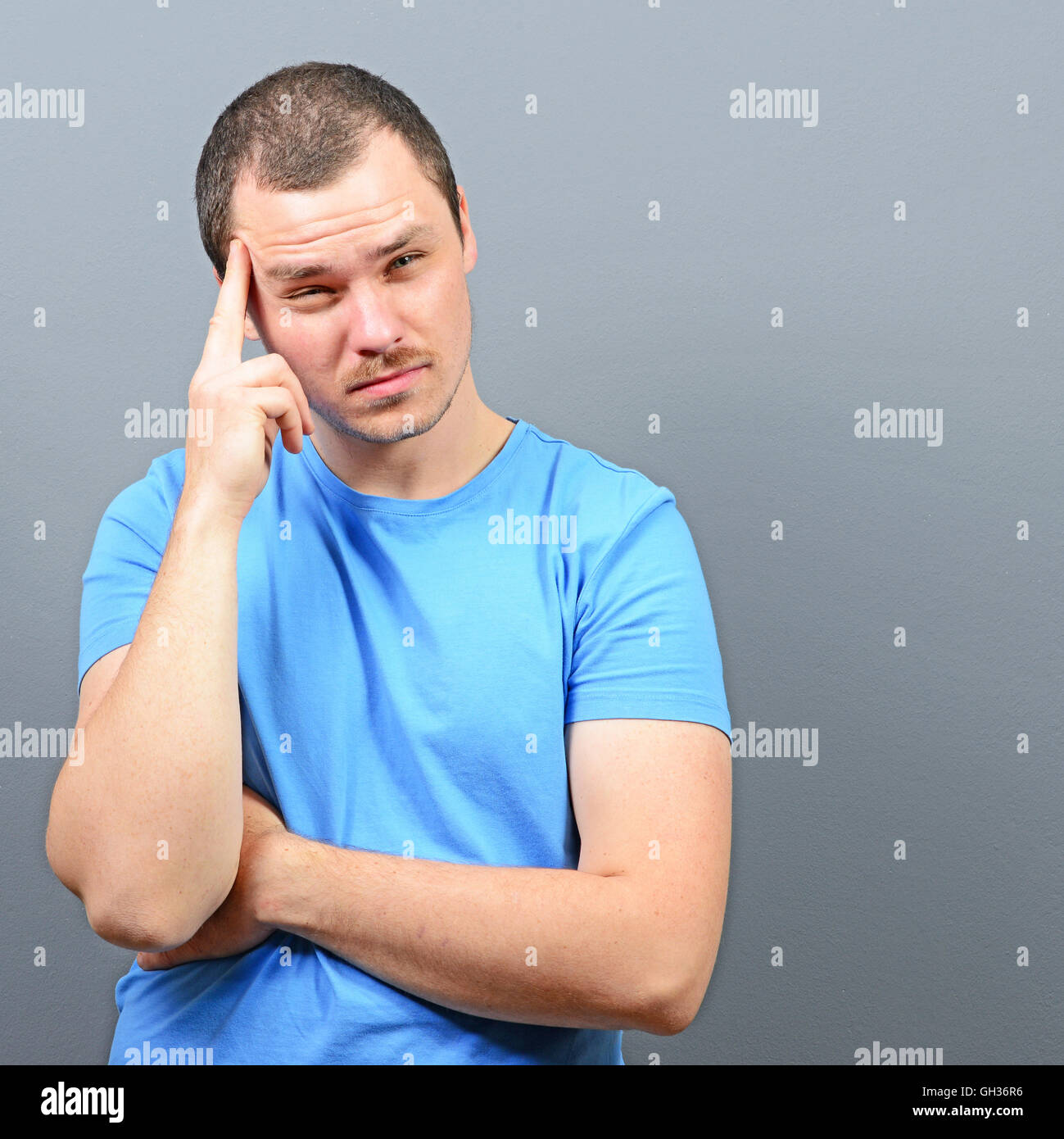 Fingers on forehead hi-res stock photography and images - Alamy