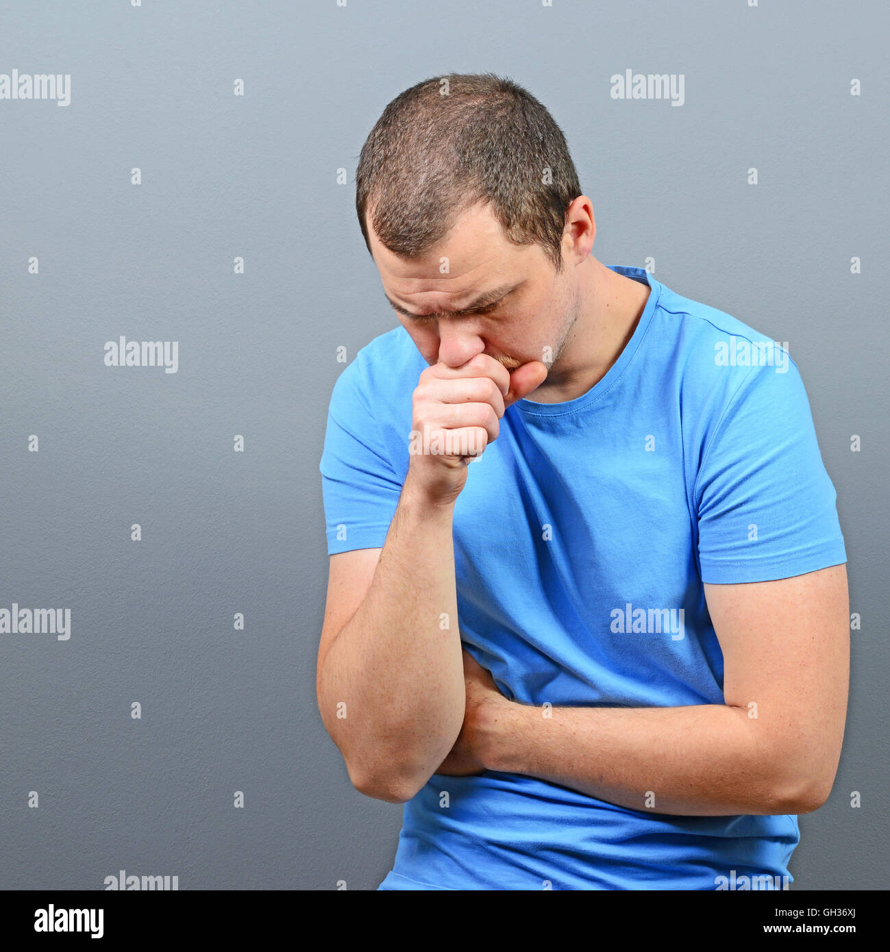 Portrait of a man suffering from chronic coughing Stock Photo - Alamy