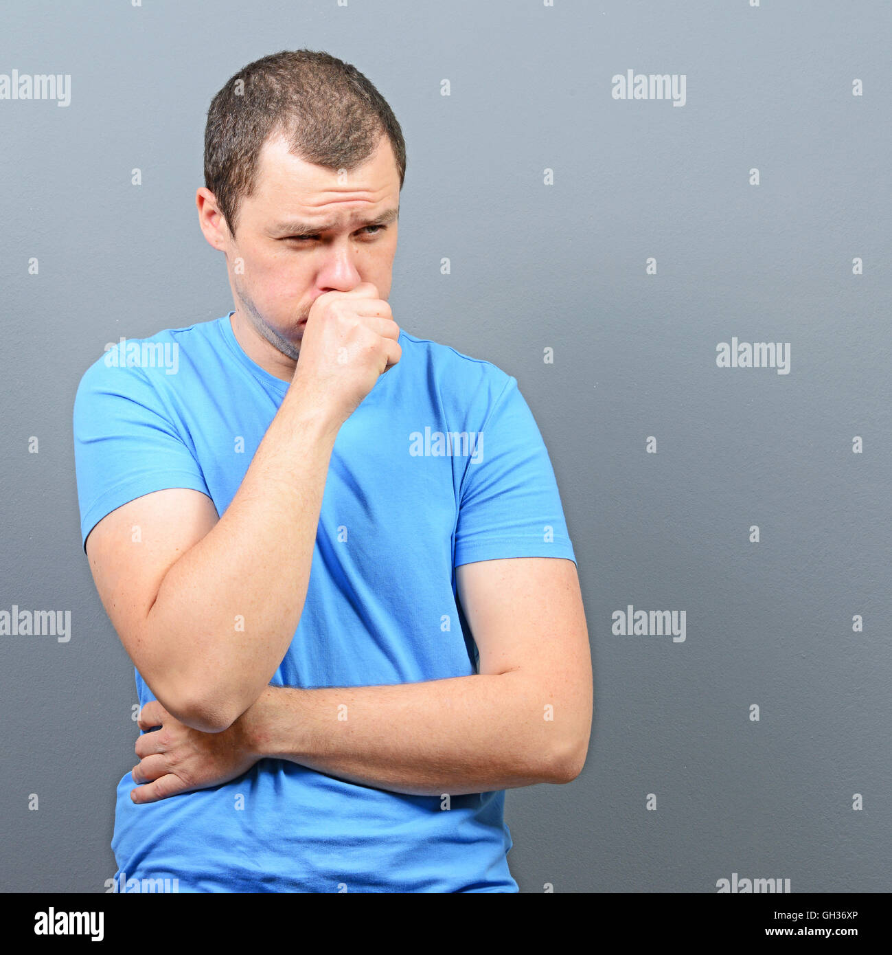Portrait of a man suffering from chronic coughing Stock Photo - Alamy