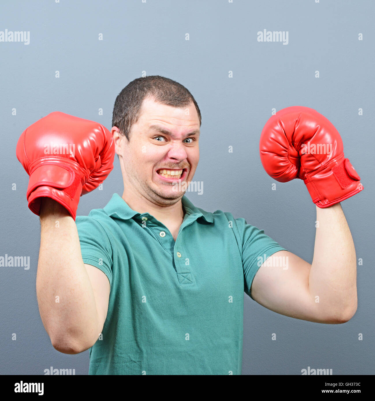 Portrait of funny boxer against gray background Stock Photo - Alamy